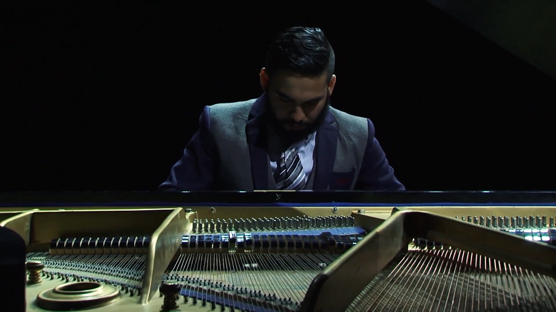 Justin Ryan Shares Inspirational Story With "Trashman Plays Piano"